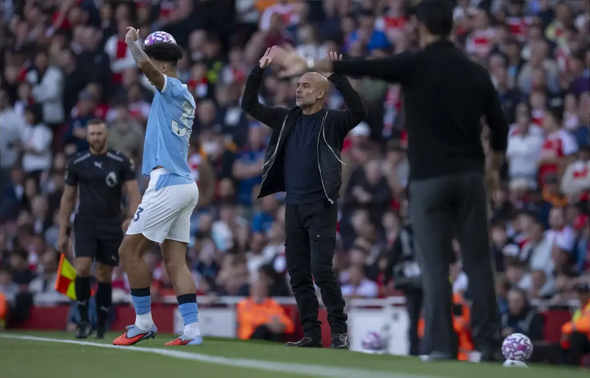 Pep Guardiola names Manchester City duo central to unconventional setup ...